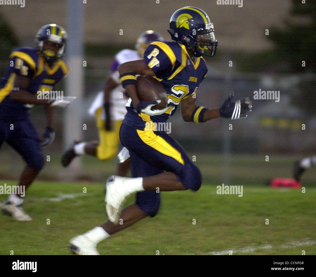 Alex Harbison of the Pinole Valley High cuts through the middle of the ...