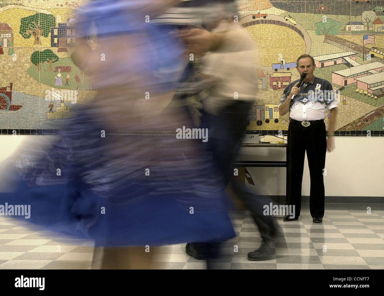 Caller Bert Swerer keeps things moving for the members of the Diablo ...