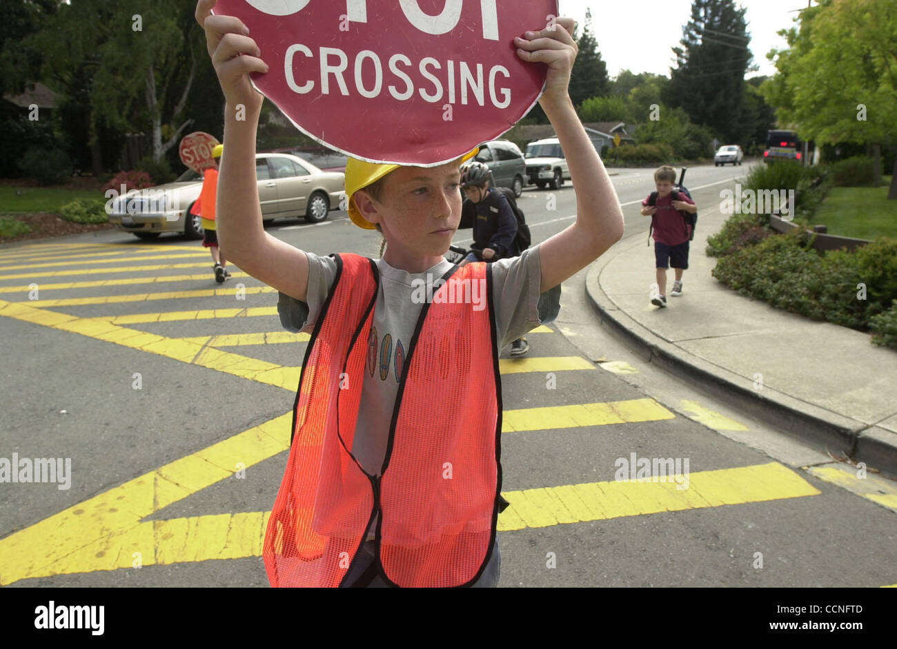 Dylan Wilson, far, background, and Cullen Ross, keep an intersection ...