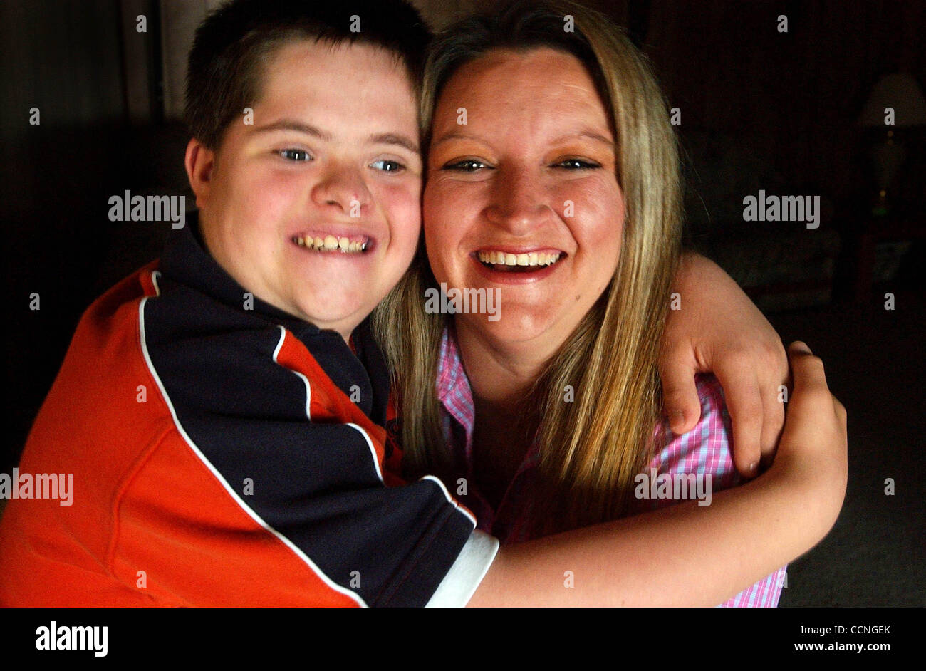 Brent Mutchler 12, and his mother, Laura Mutchler pose for a photo at ...