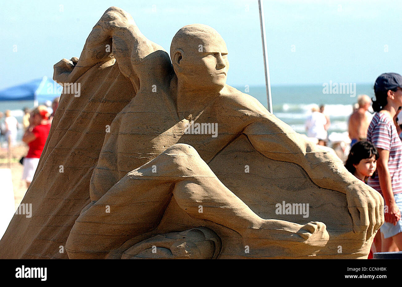 STATE/DAILY/SAND CASTLE DAYS: A relief of a man running sculpted by ...