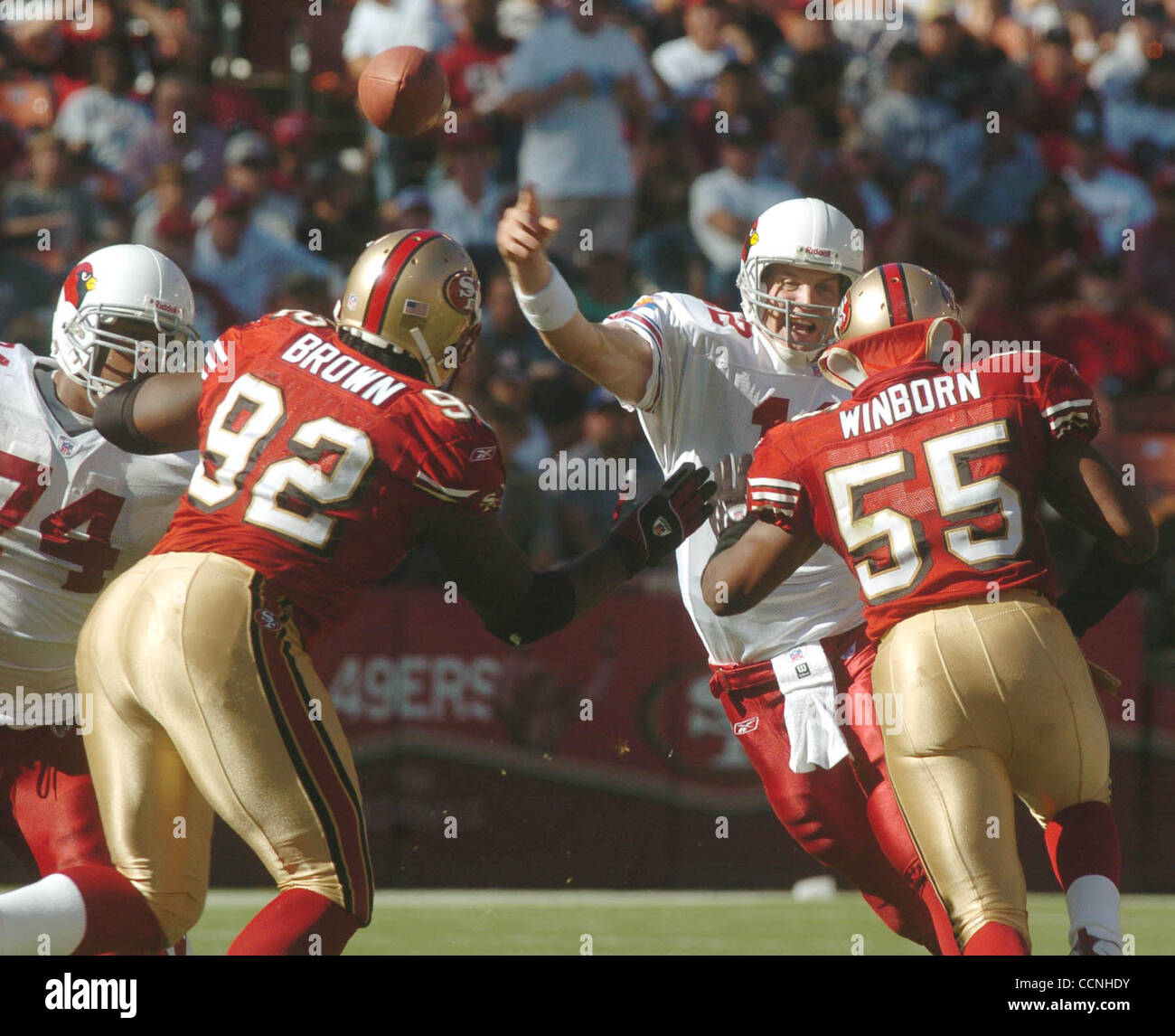 San Francisco Forty Niners Tony Brown, #92 and Jamie Winborn put the ...