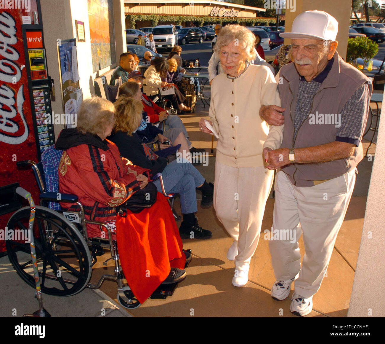 Maxine Goodbread,94, (all white) and Max Schwartz,93, (hat) make their ...