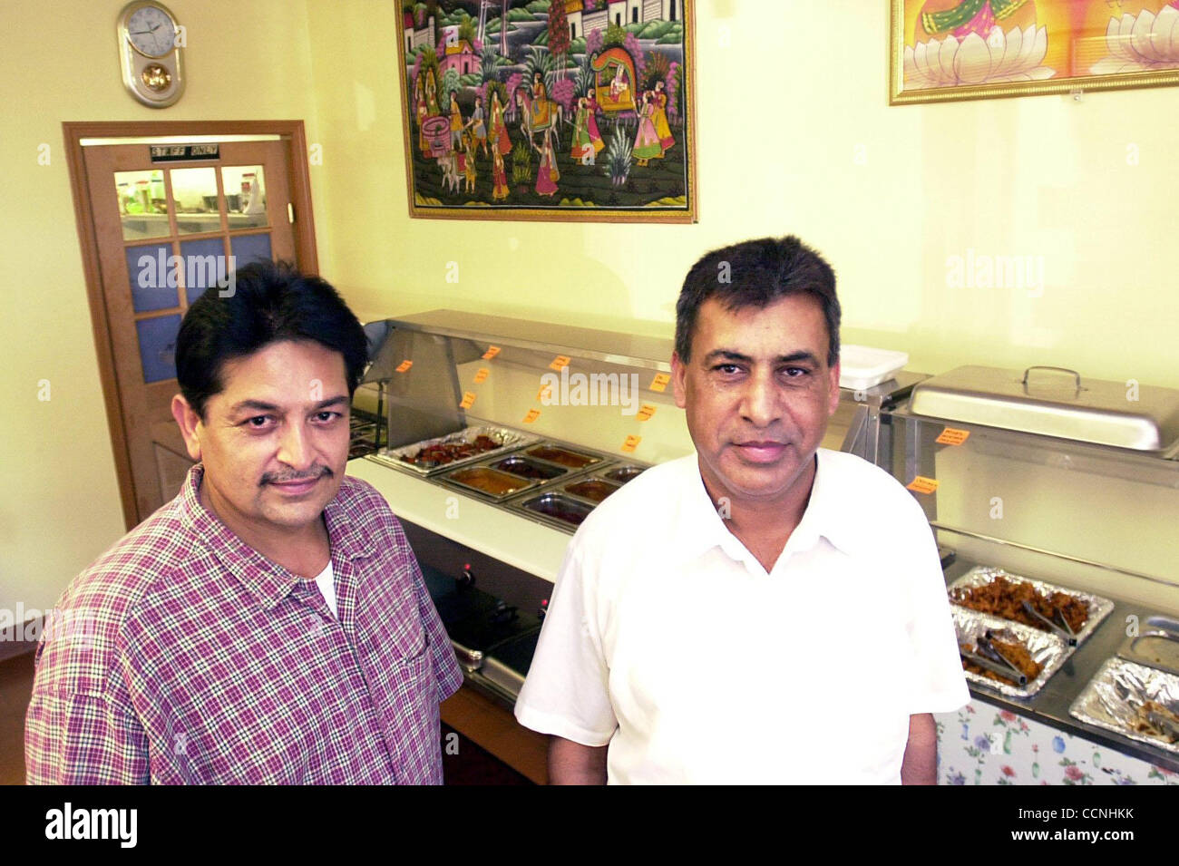 Owner Sarbjit Bains (cq)(right) and chef Maan Singh (cq) pose at ...