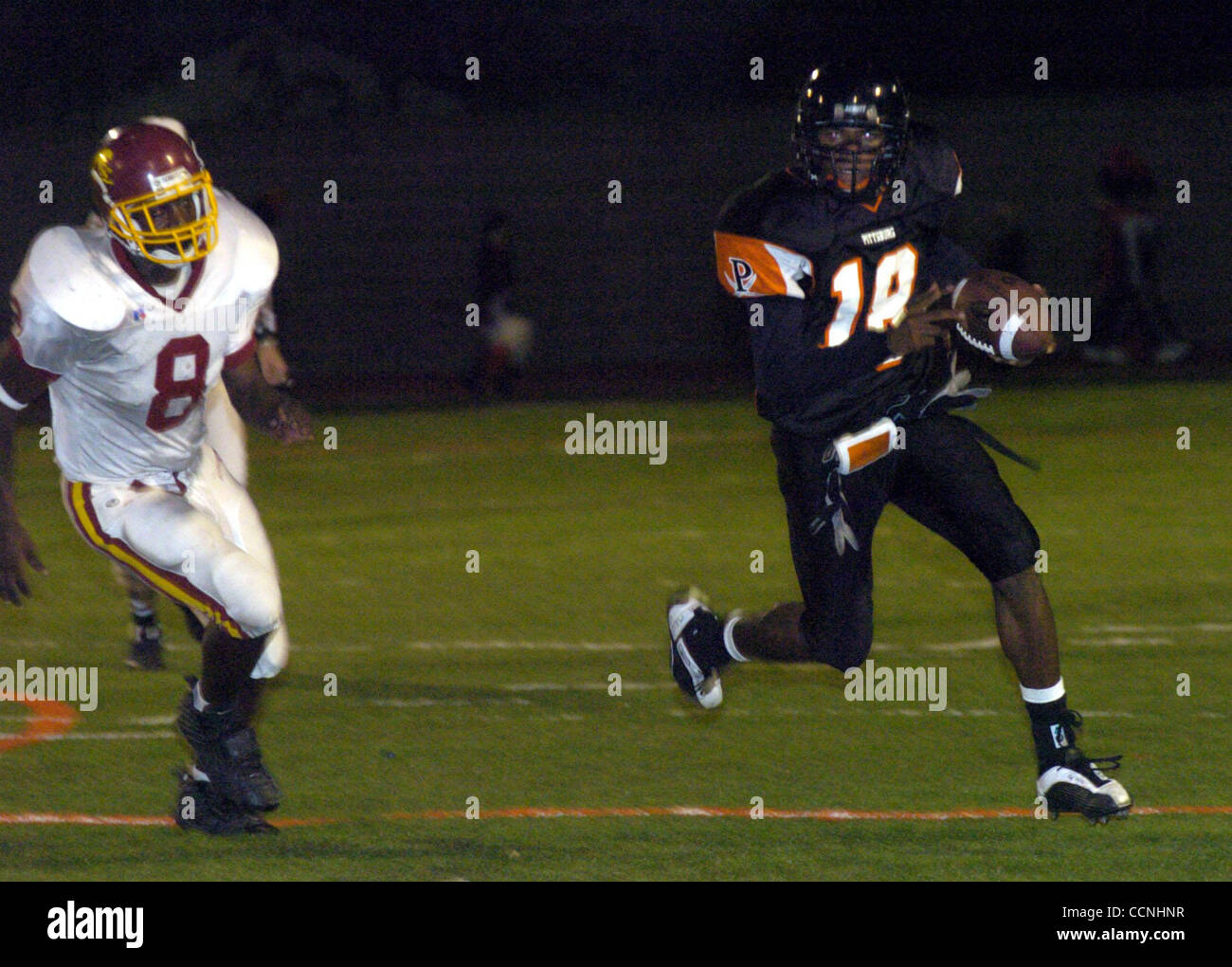 Pittsburg quarter back Jason Crawley (cq) breaks past Liberty's Calvin ...
