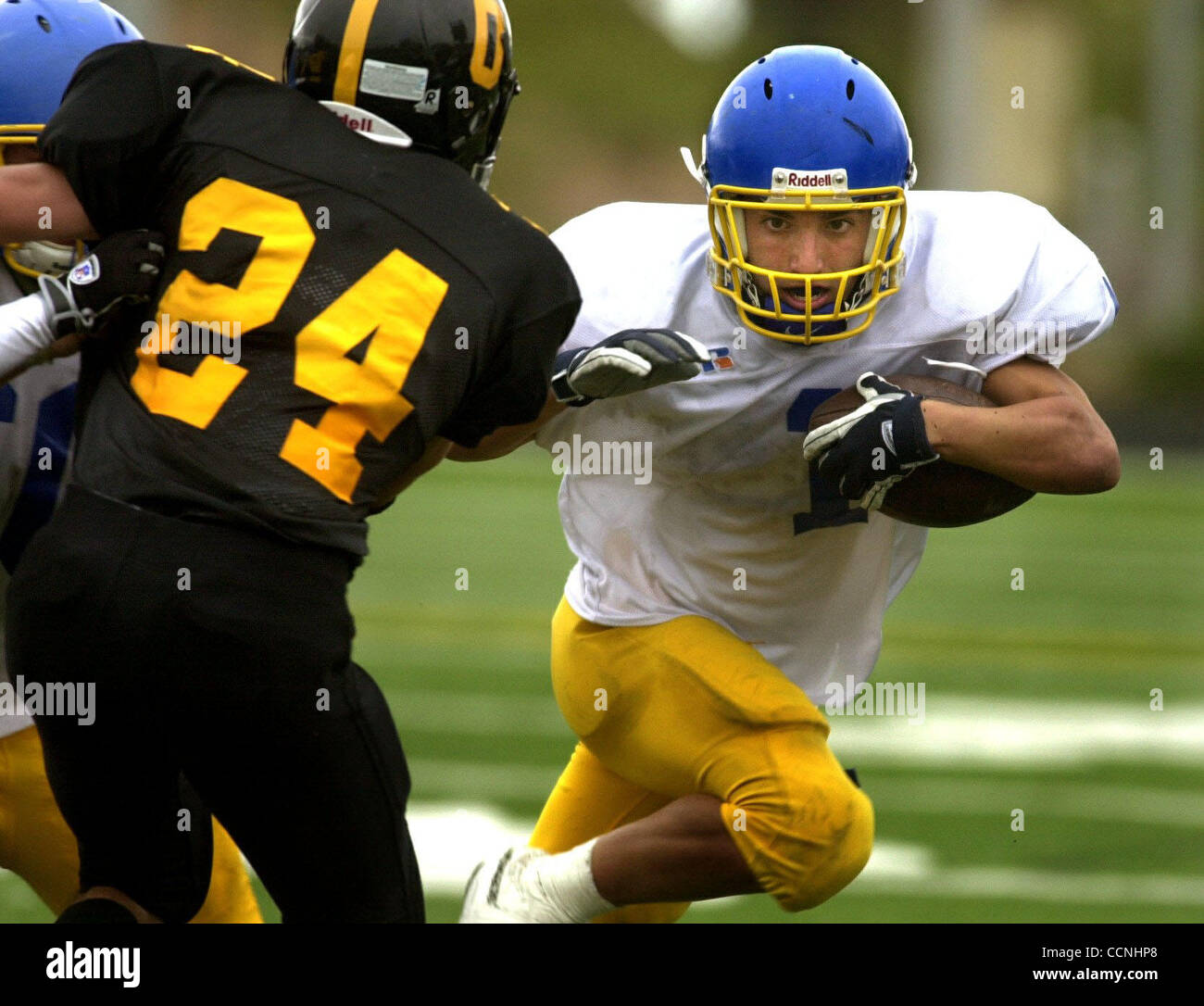 Foothill High's #1 Willie Keck (left) gets around Bishop O'Dowd's #24 ...