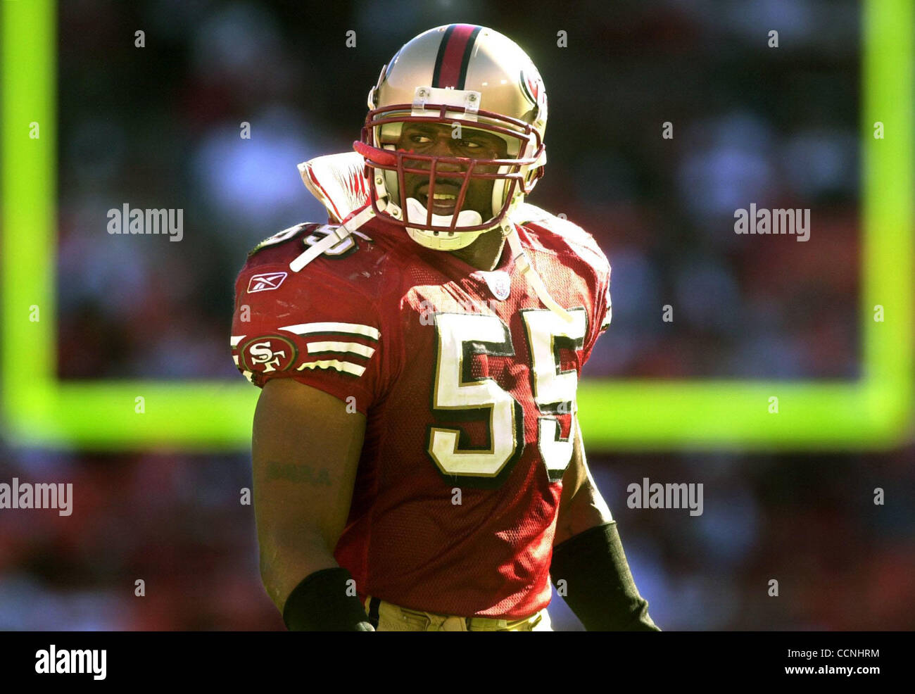 FILE--An upset 49ers #55 Jamie Winborn looks at the referees after the ...