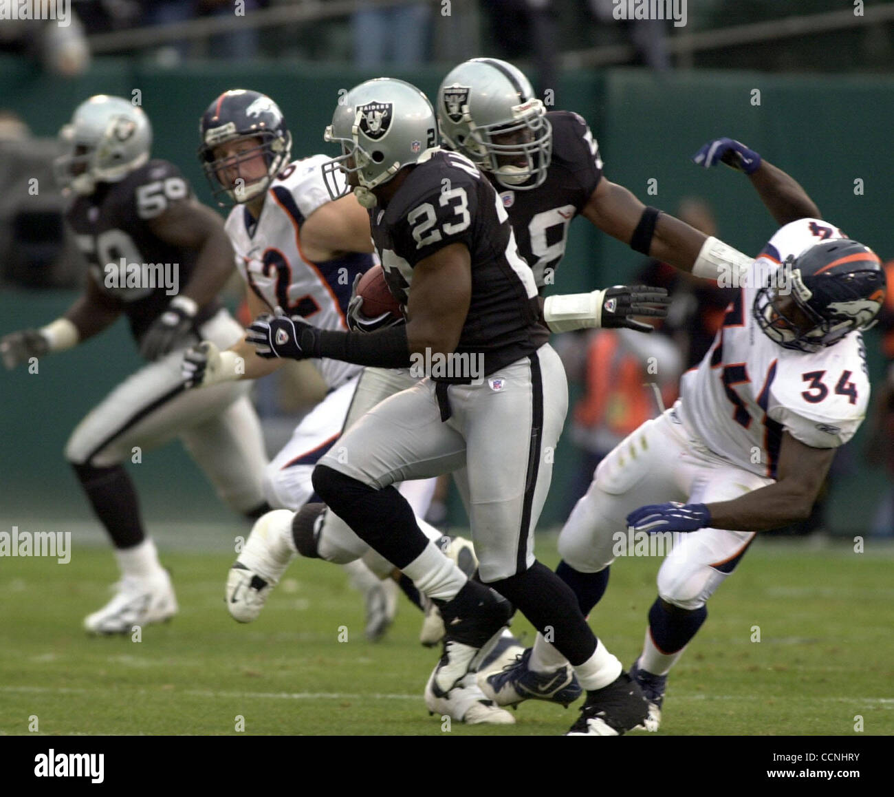 Oakland Raiders safety Marques Anderson intercepts a pass thrown to ...