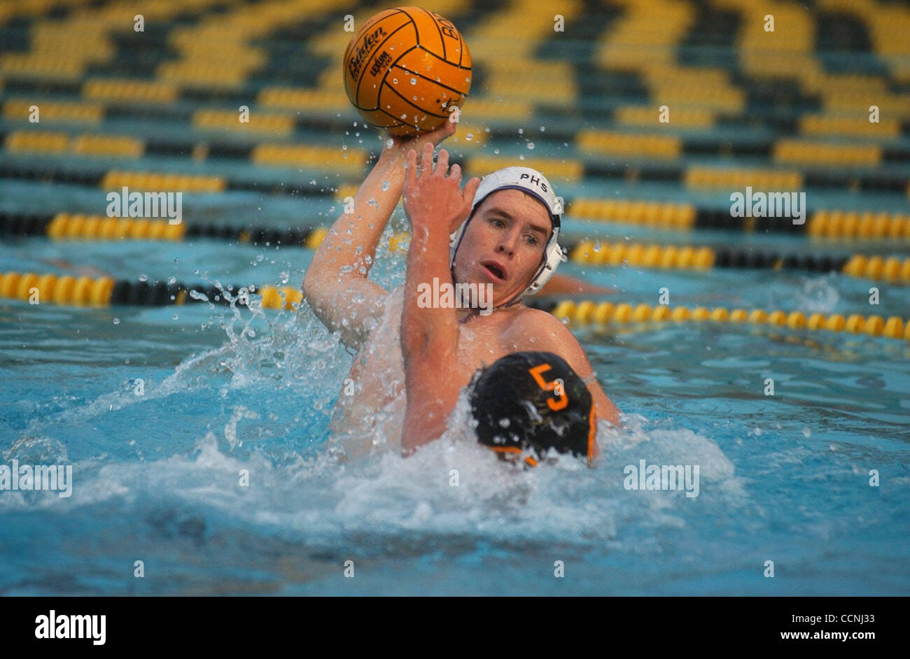 Piedmont's John Savage (14) aims at Bishop O'Dowd's goal with BOD's Tom ...