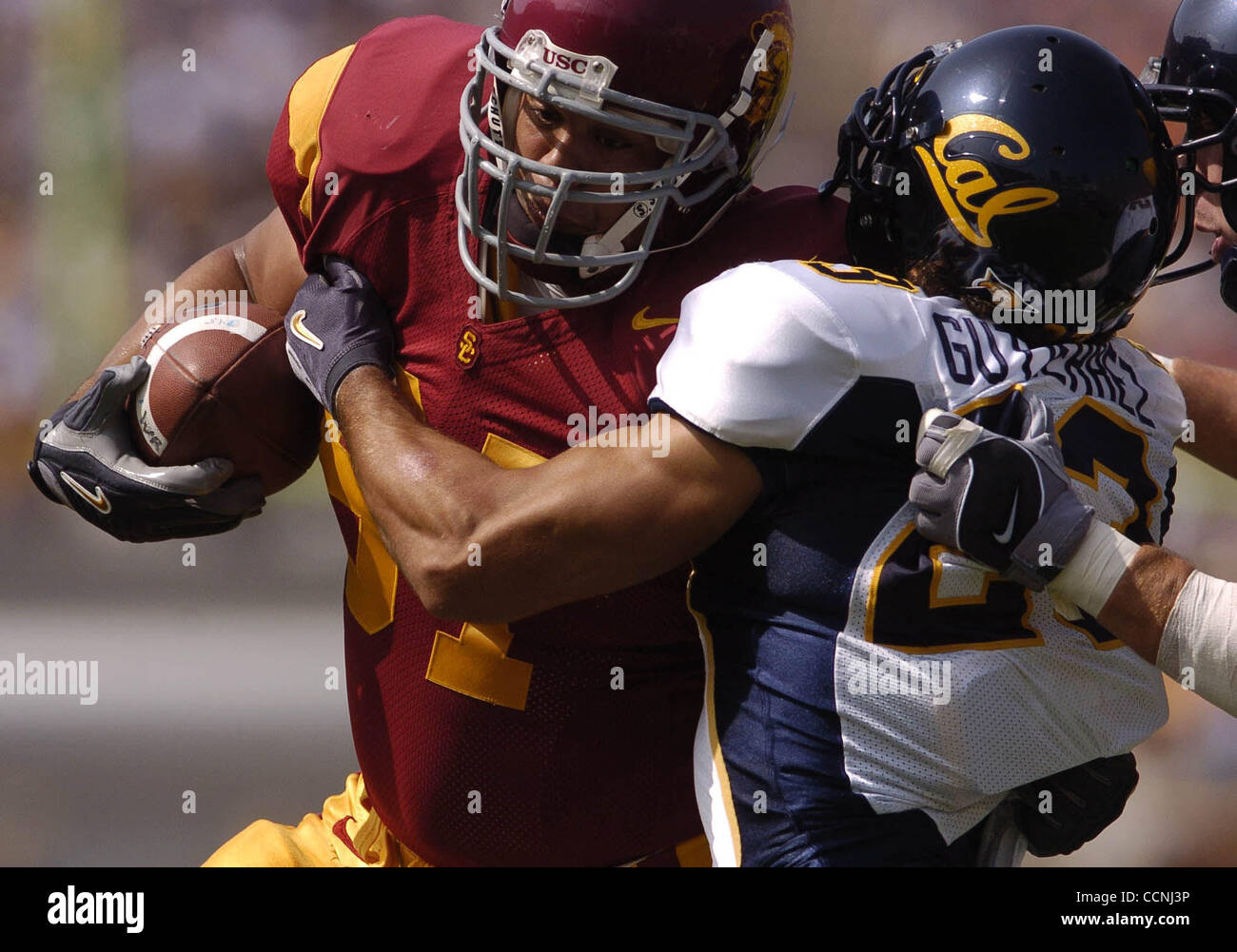 Cal's Ryan Gutierrez, #23, tackles USC's Alex Holmes, #81, in the 1st ...
