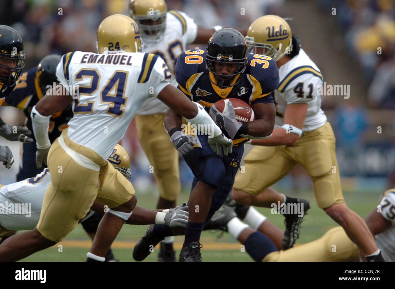 J.J. Arrington slices through the UCLA defense in the 1st quarter ...