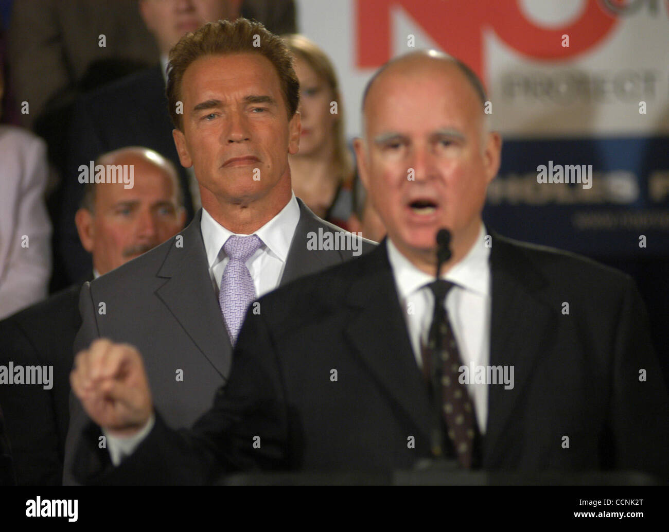 California Gov. Arnold Schwarzenegger, looks on as former California ...