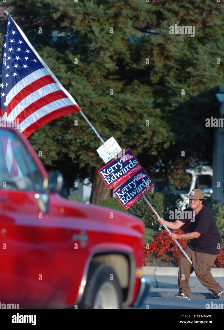On the corner of Valley Avenue and Hopyard Road, flag waving John Kerry ...