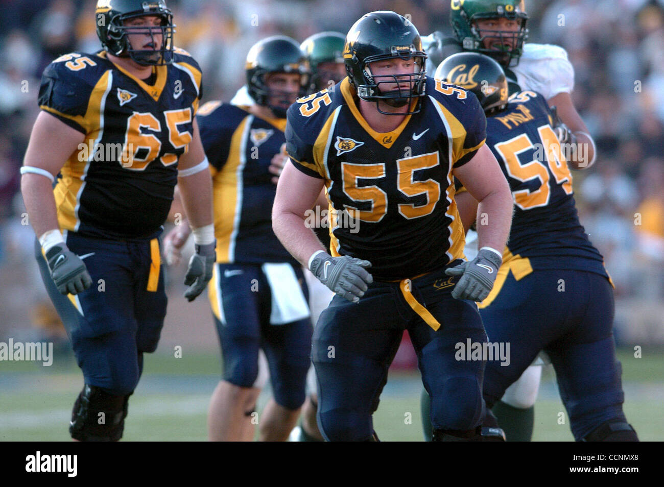 Cal's offensive lineman #65 Aaron Merz, #55 Jonathan Giesel and #54 ...