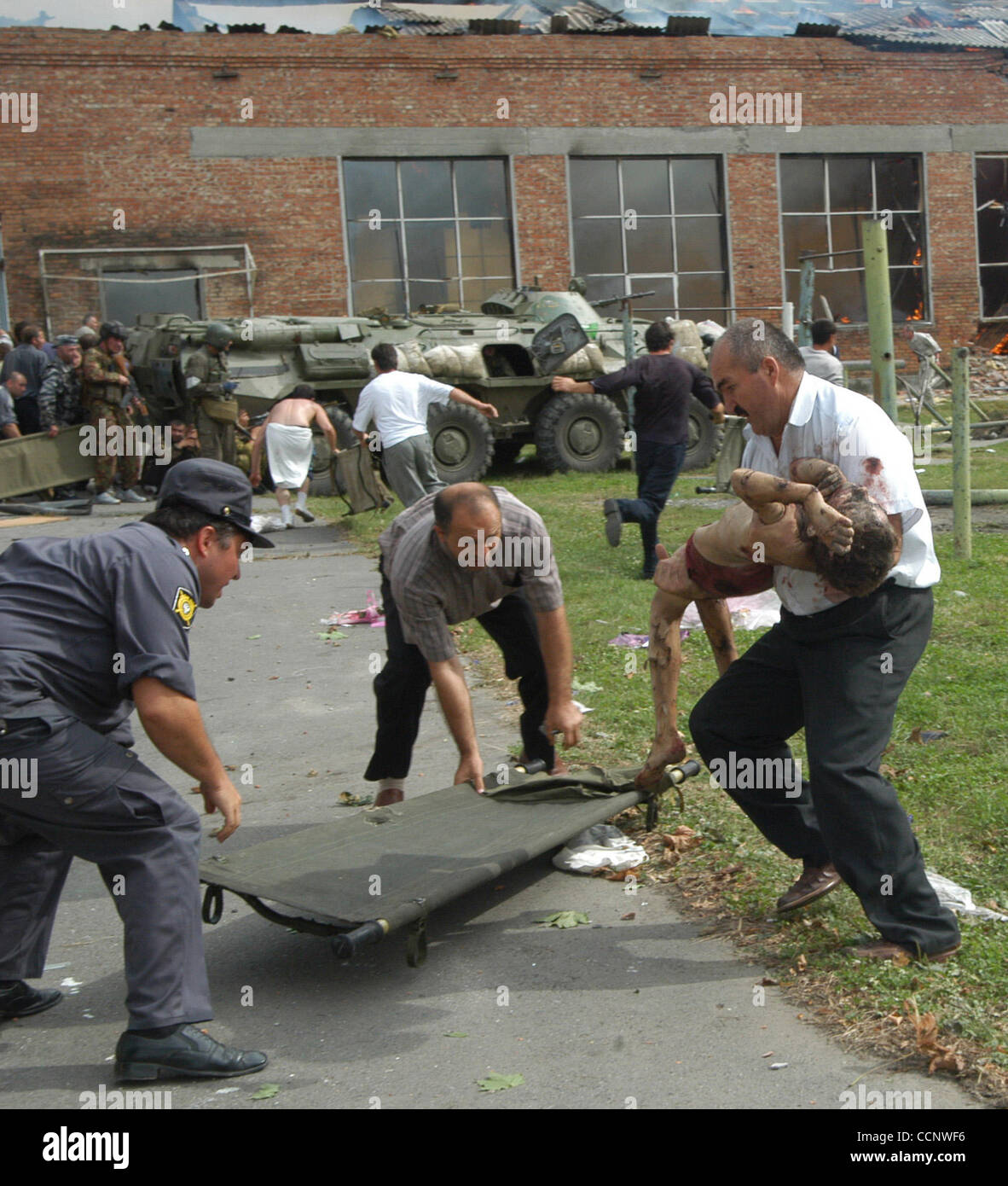 Five years on from the Beslan school siege ; pictured: local people ...