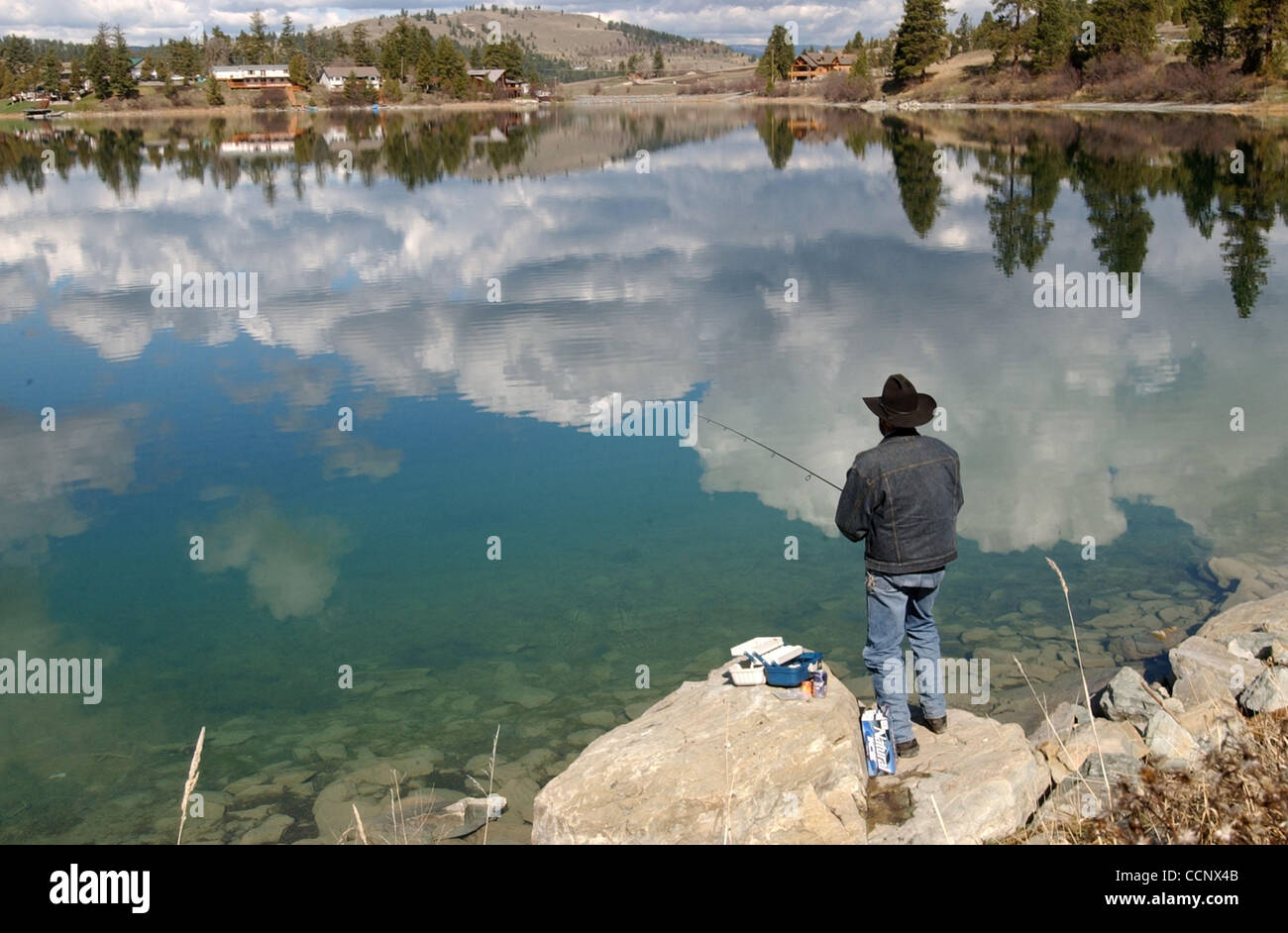 Apr 16, 2003 - Kalispell, Montana, U.S. - Clouds are reflected in the ...