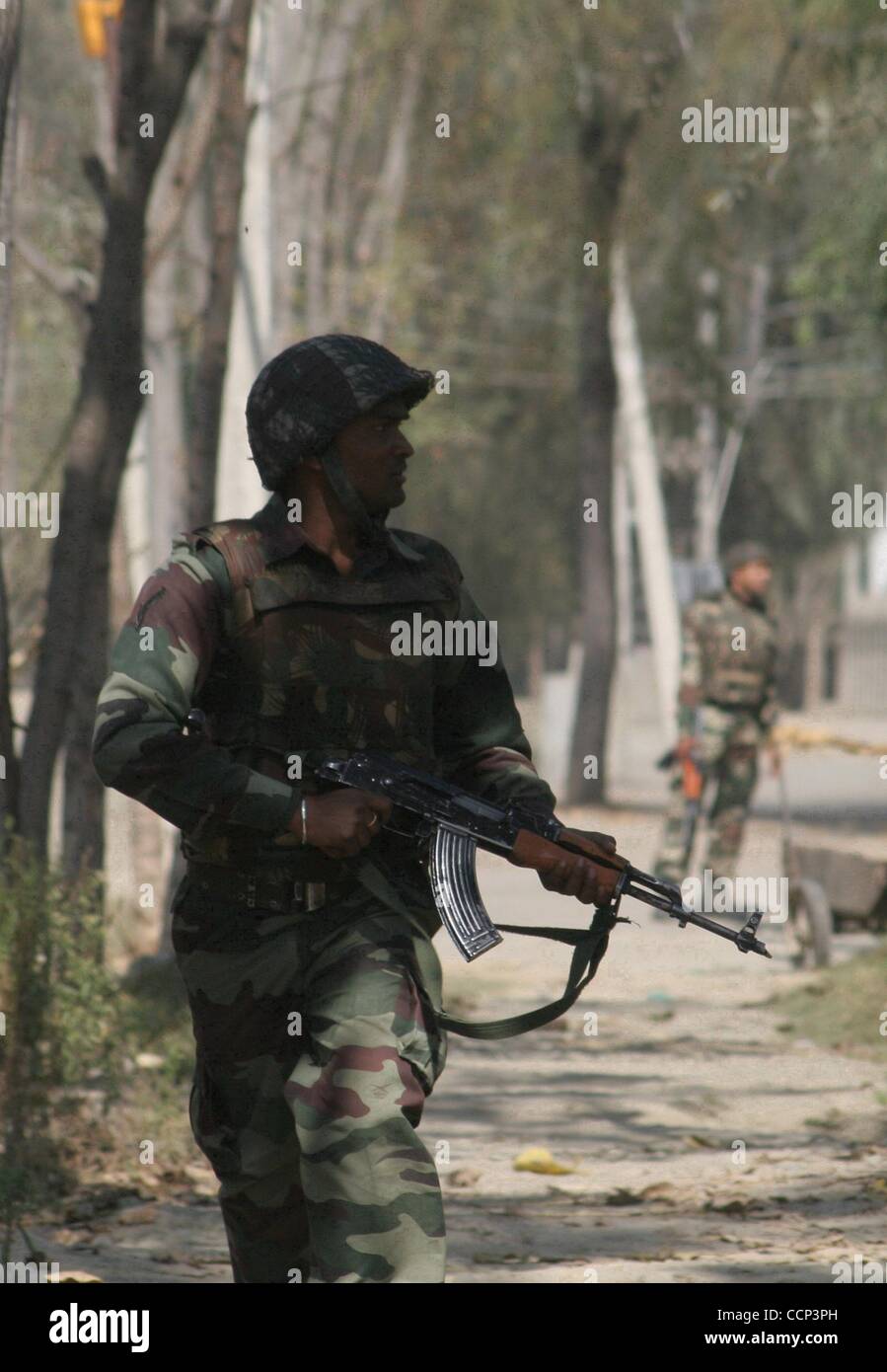 Oct 21, 2010 - Kashmir, Srinagar, India - An Indian army soldier runs ...