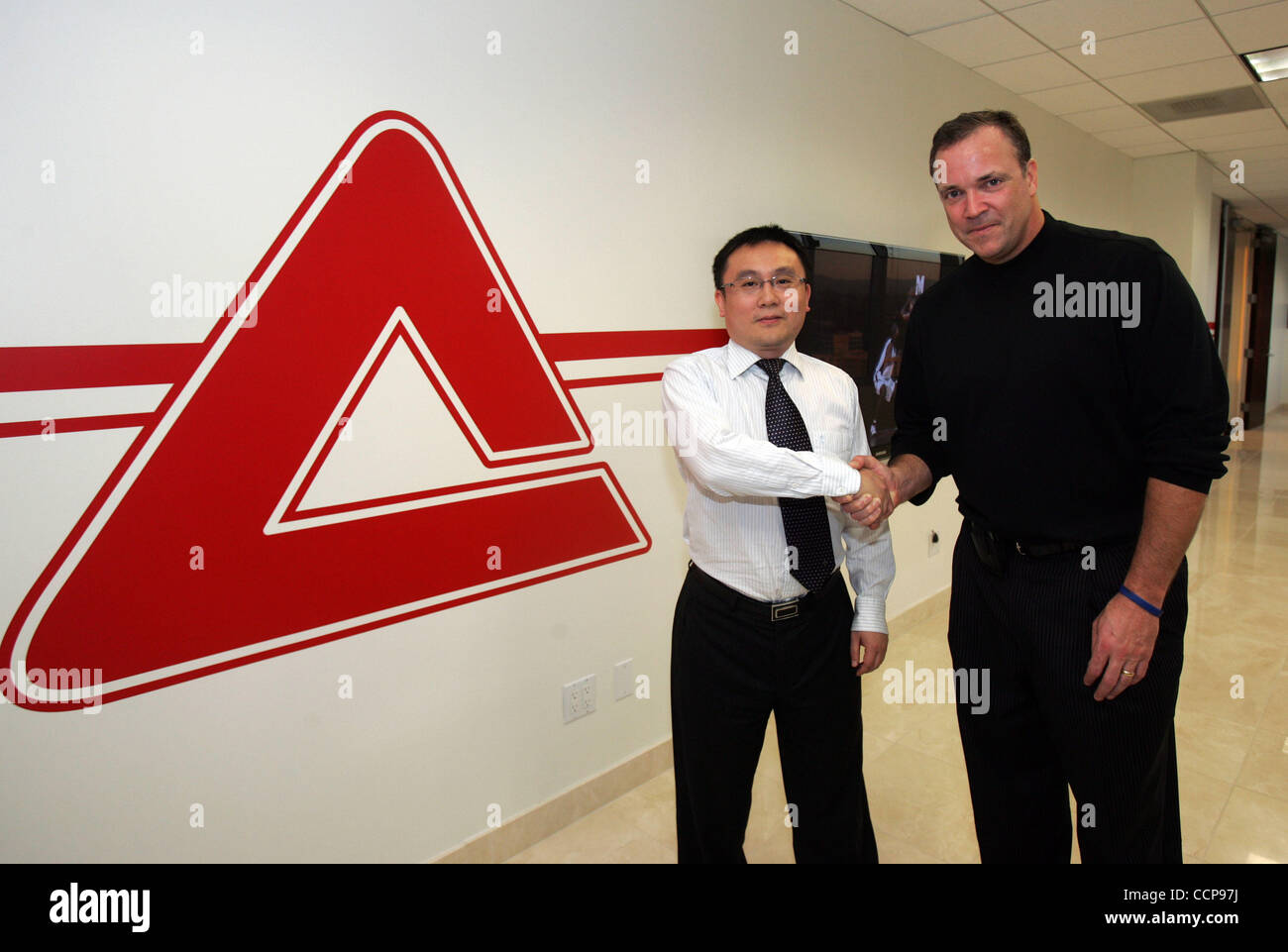 Tad Brown, CEO of Houston Rockets and Su Jia, CEO of Peak Sport ...