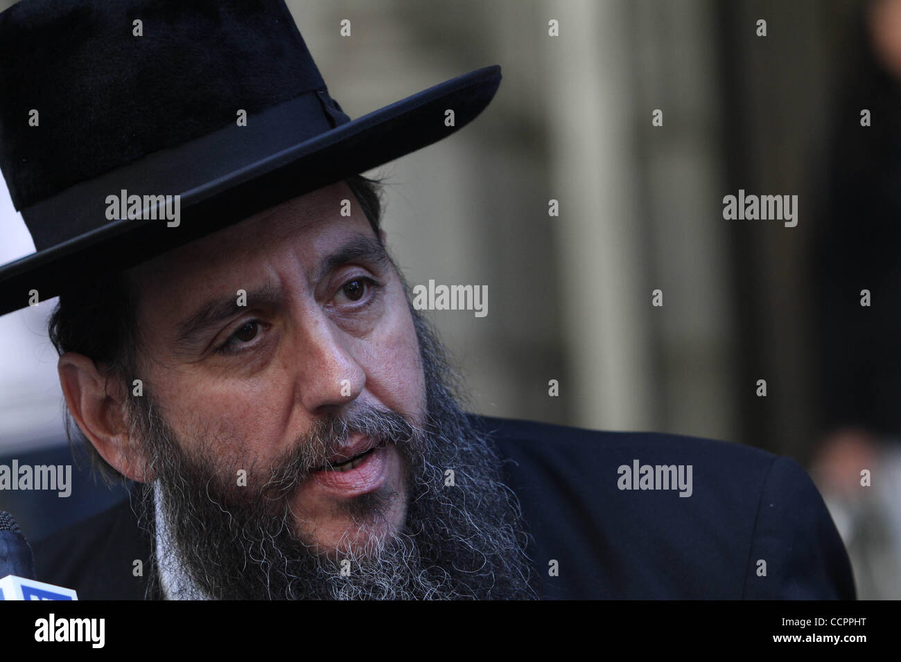 Rabbi Yehuda Levin talking to reporters in front of St. Patrick's ...
