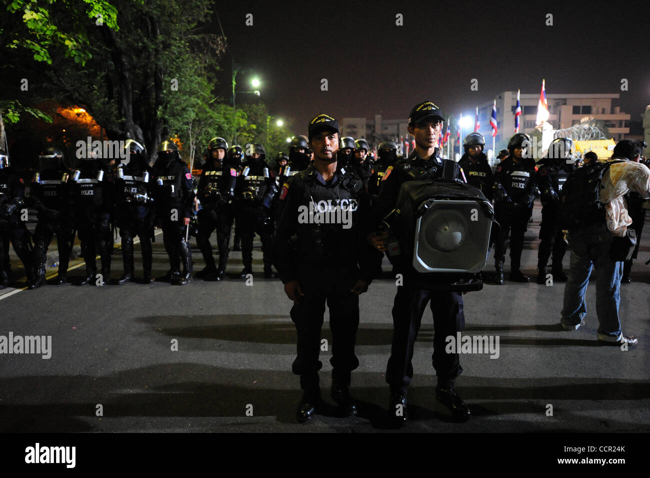 Police broadcast orders via lound speaker while Red Shirts led by ...