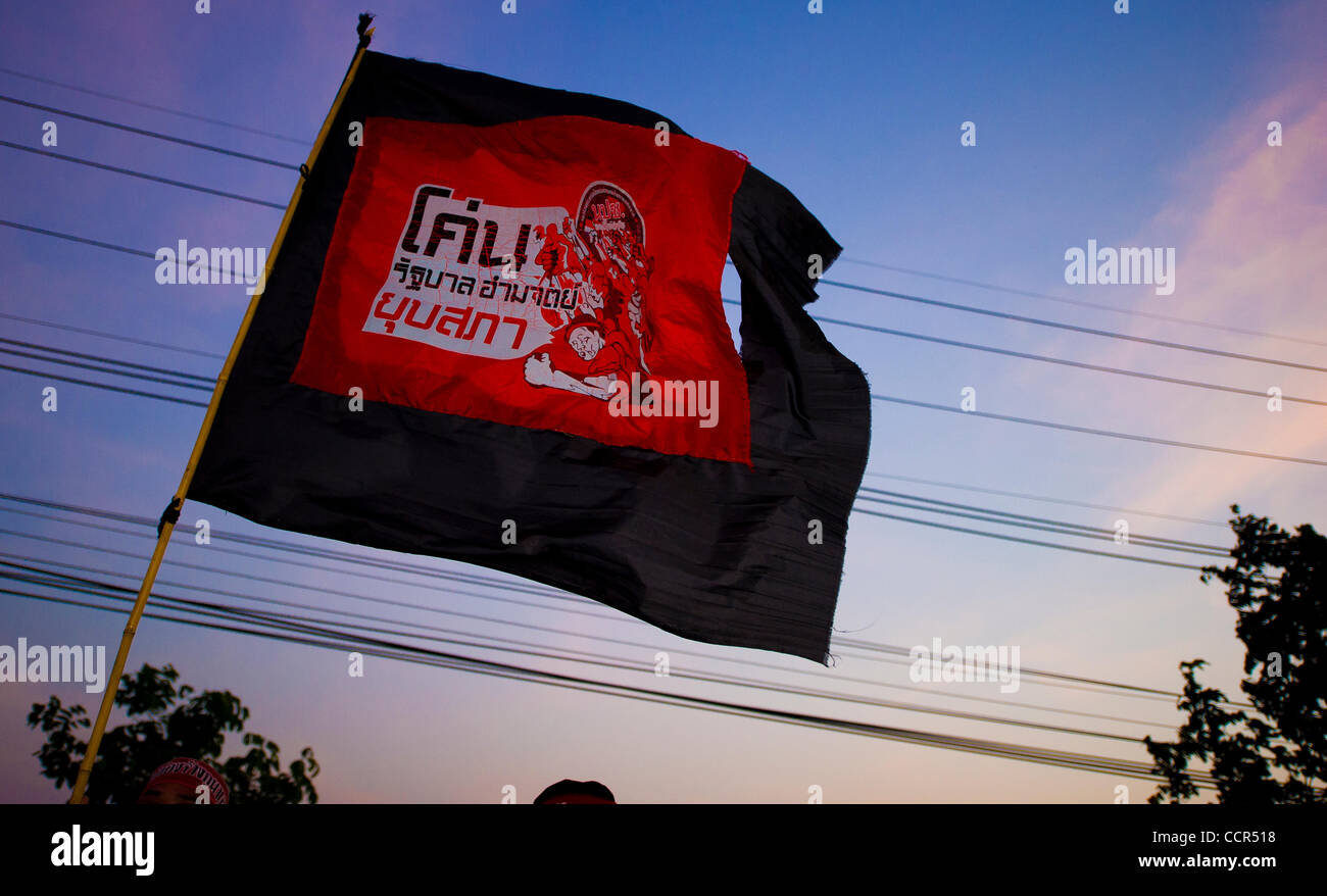 A truck with Red Shirts' flag that reads 'Dissolve the Parliament ...