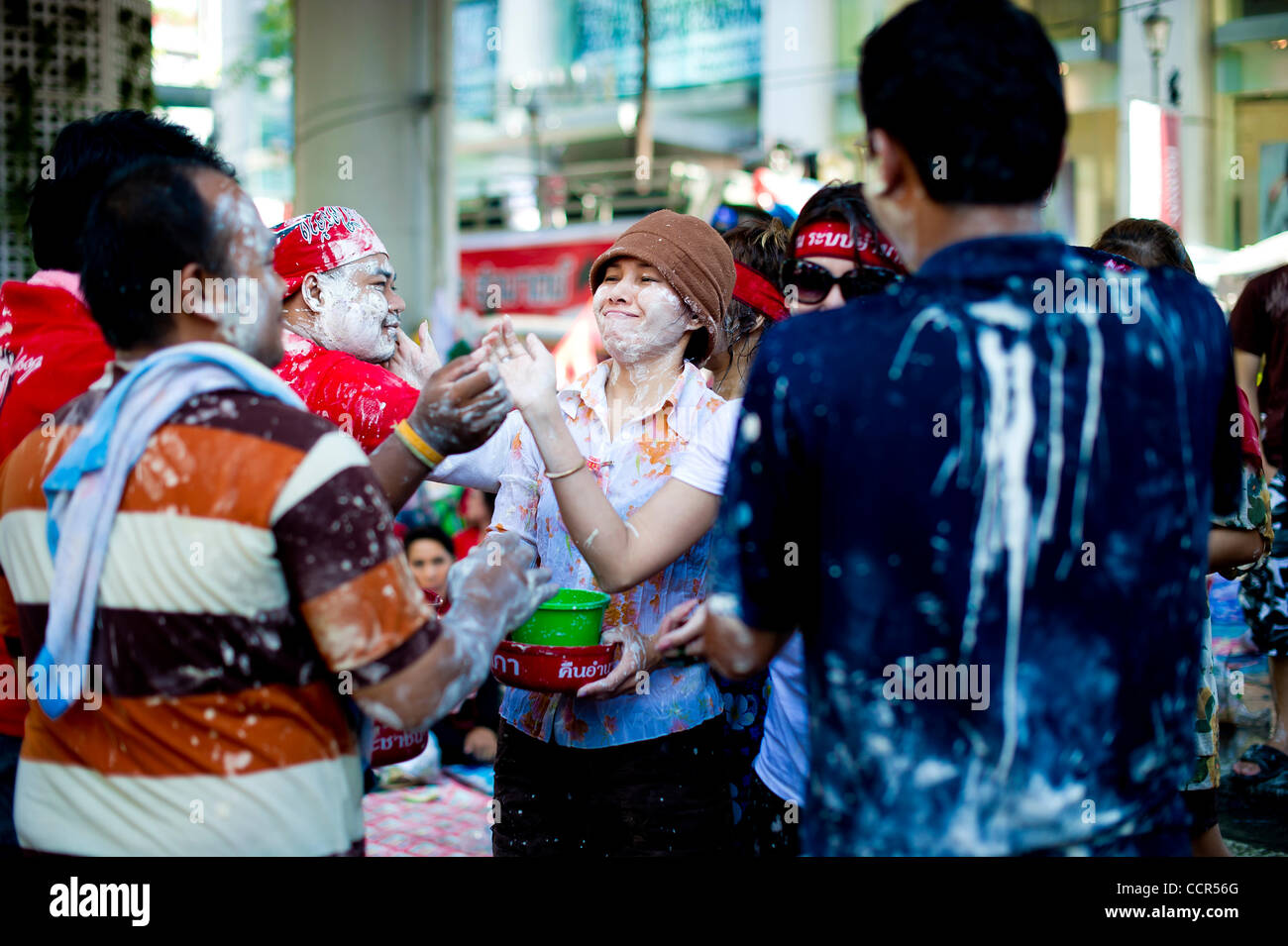 Red Shirts and tourist celebrates Songkran festival at Ratchaprasong ...