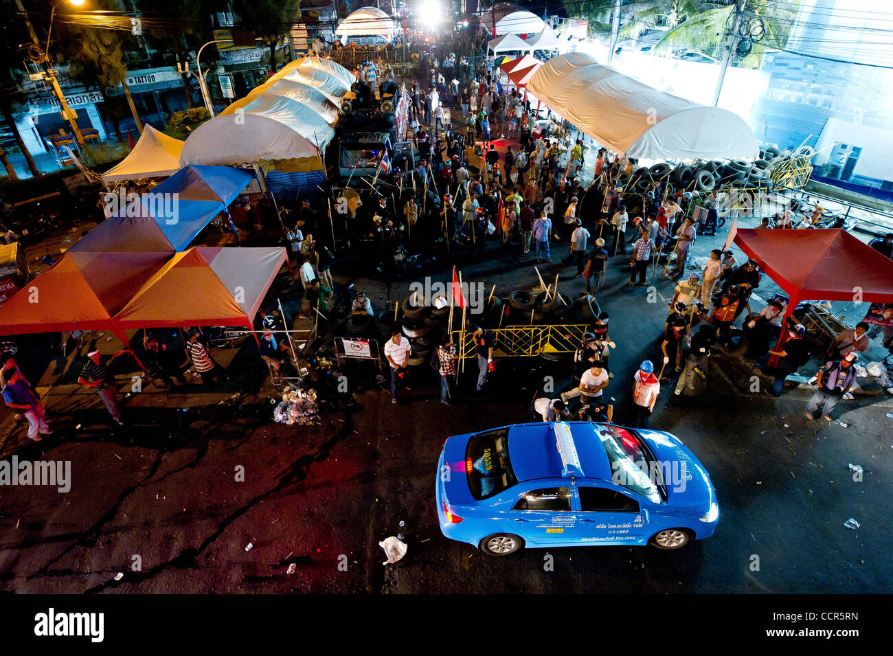 Red Shirts fortify their barrier with tires and sharpened bamboo sticks ...