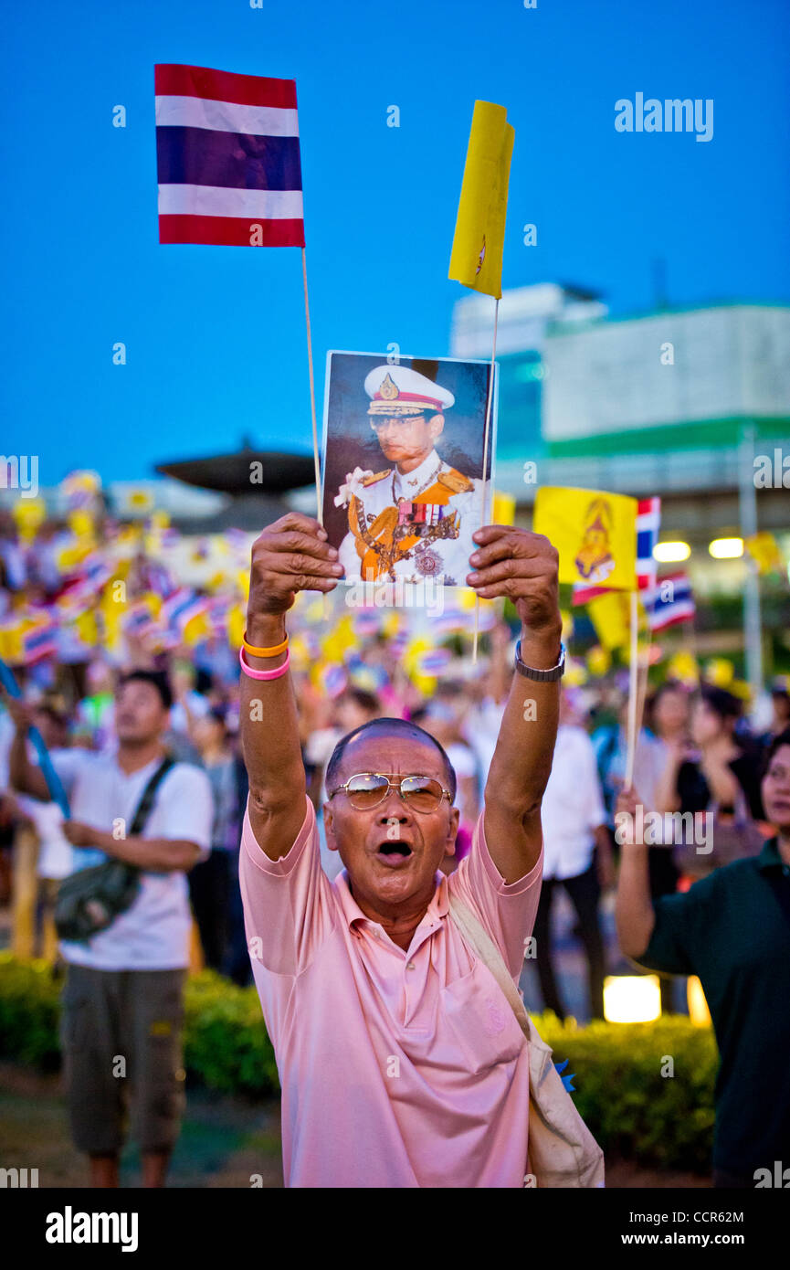 A Pro Government Supporters Holds A Portrait Of Thai King Bhumibol
