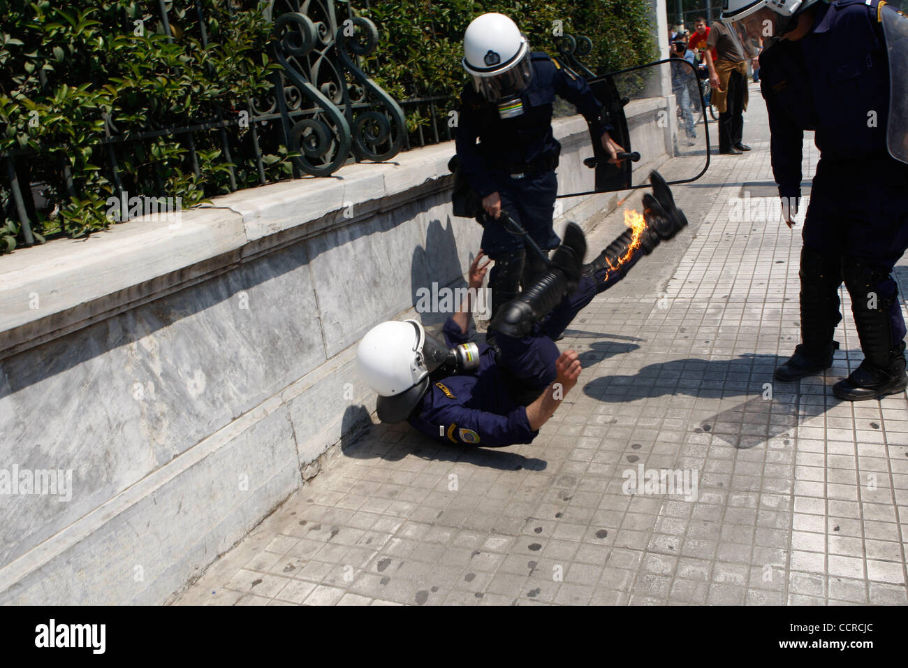 May 01, 2010 - Athens, Greece - A riot policeman burnt when protesters ...