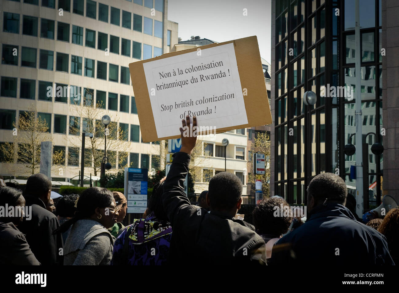 Demonstrators from Rwanda protest in front of the building of the ...