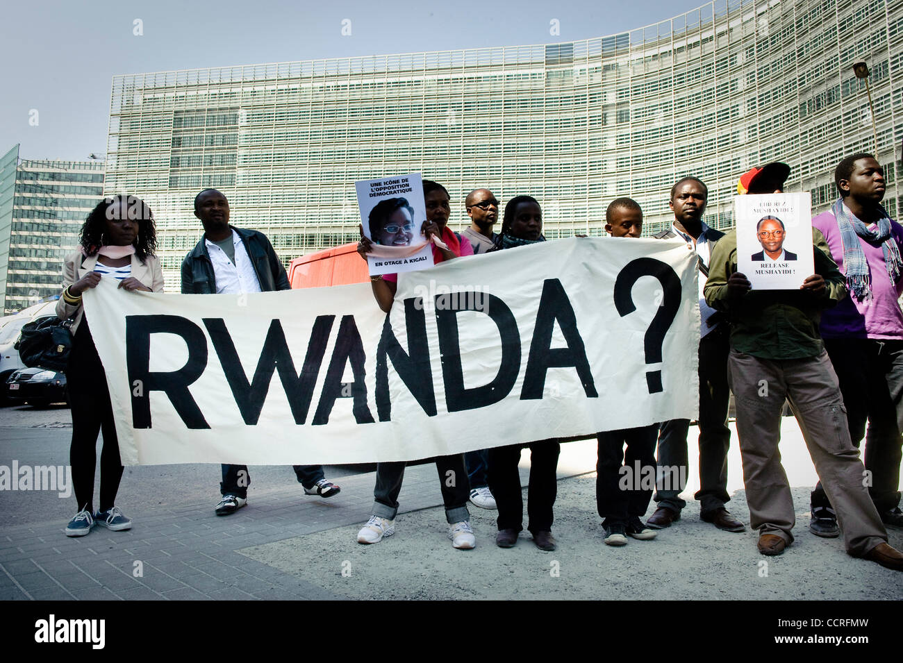 Demonstrators from Rwanda protest in front of the building of the ...