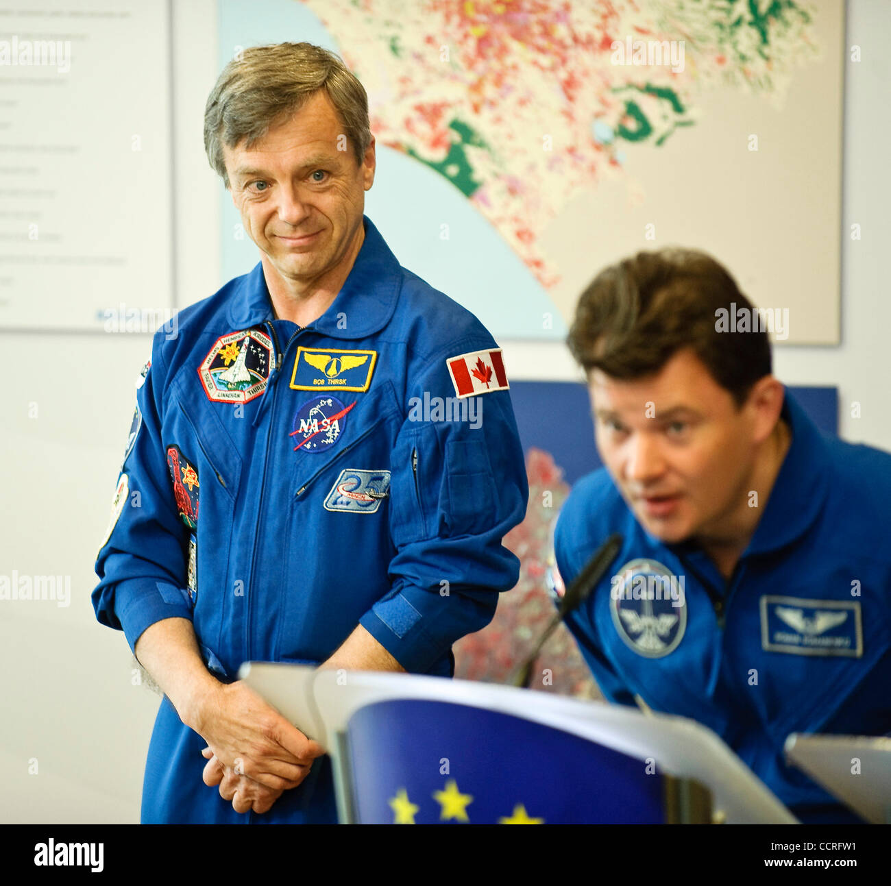 Last International Space Station (ISS) crew Roman Romanenko (R) from ...
