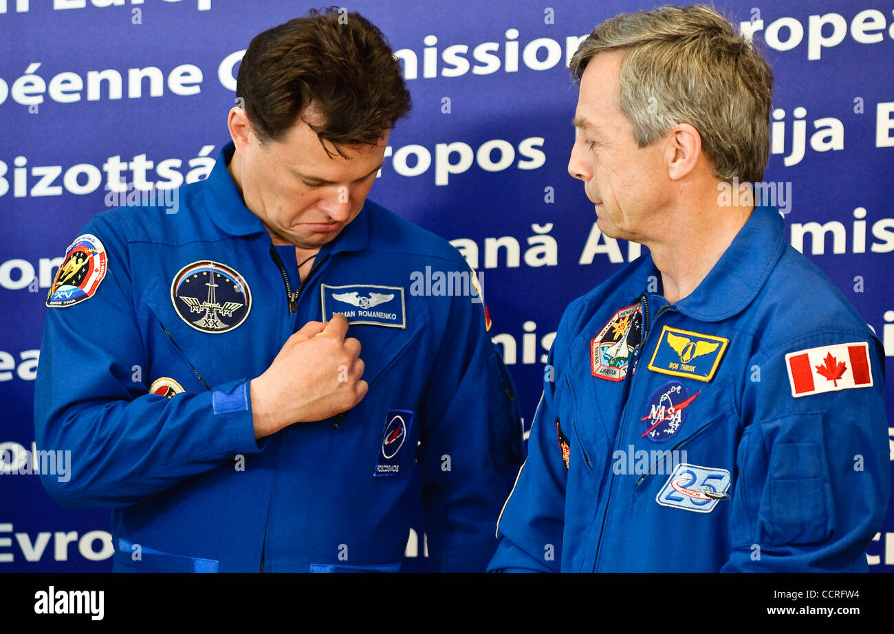 Last International Space Station (ISS) crew Roman Romanenko (L) from ...