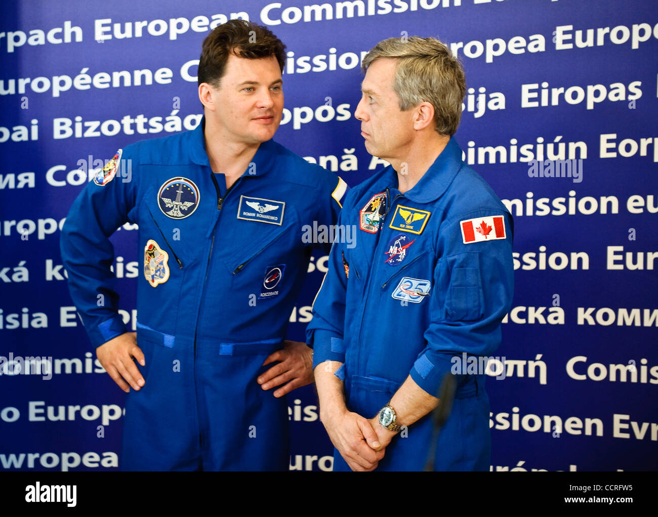 Last International Space Station (ISS) crew Roman Romanenko (L) from ...