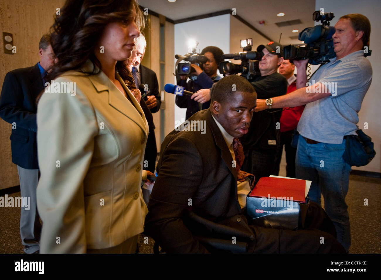 After their court arraignment John Smiley and wife Cynthia Ann Biasi ...