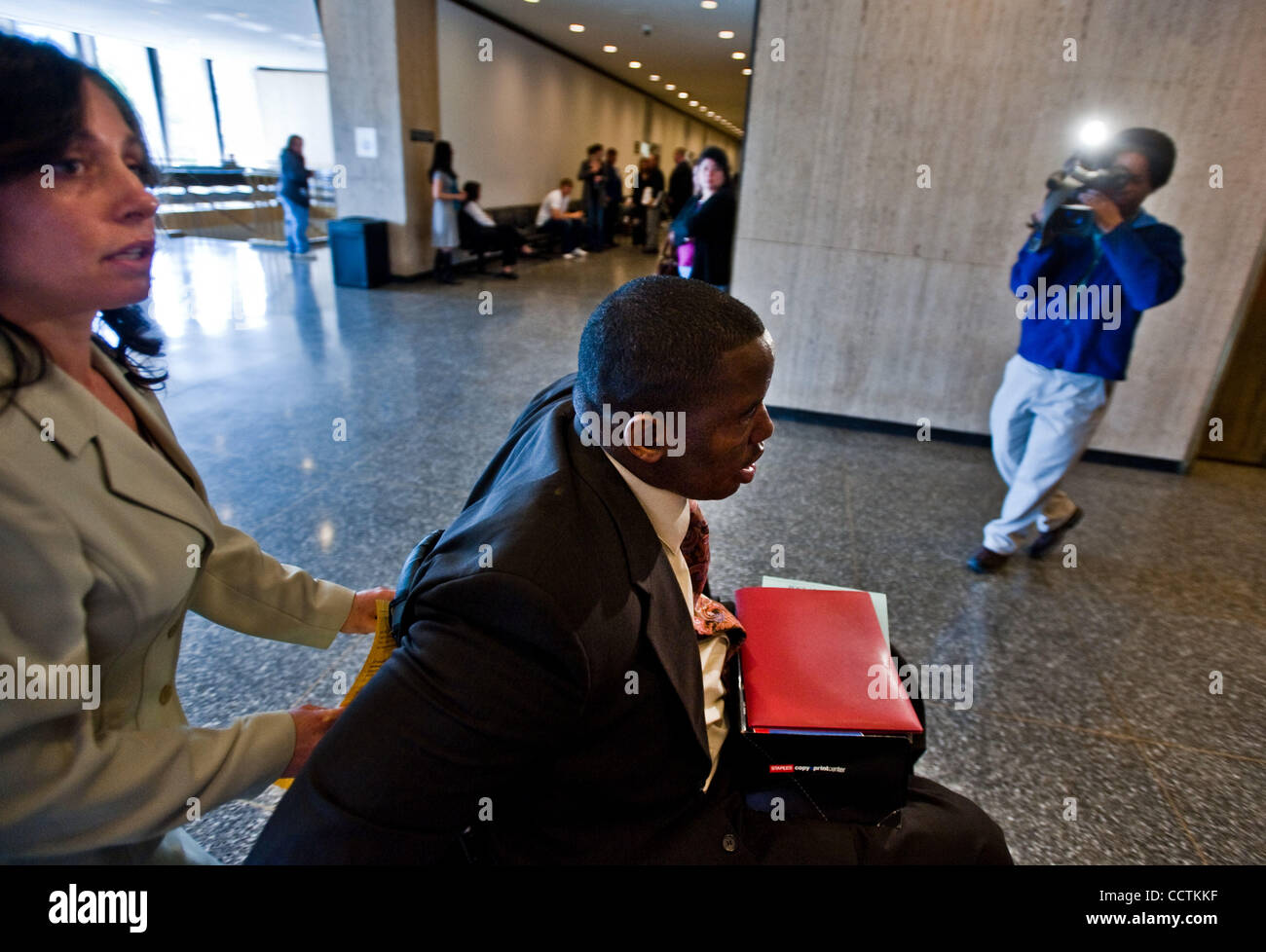 After their court arraignment John Smiley and wife Cynthia Ann Biasi ...