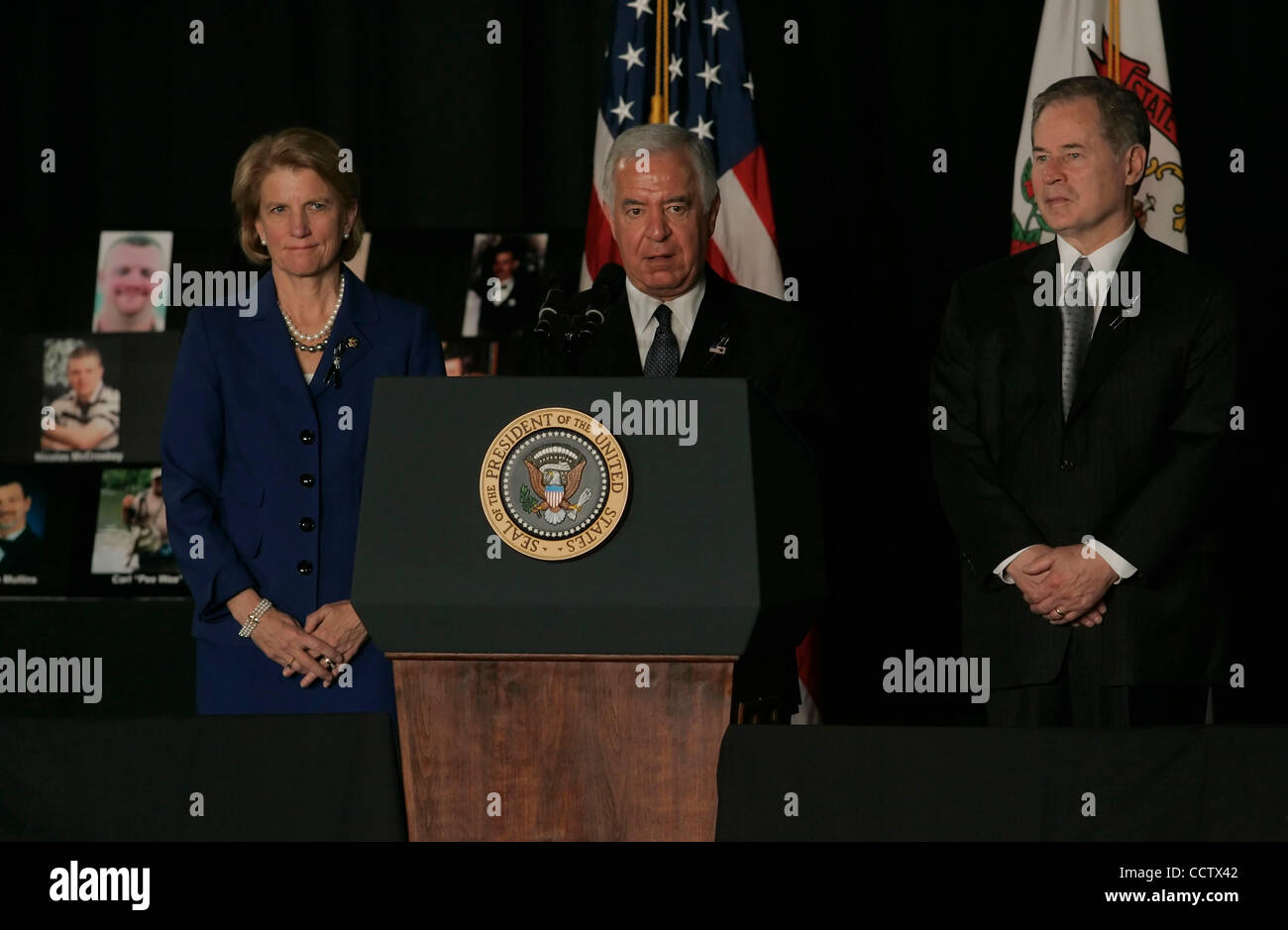 Representative NICK JOE RAHALL II (center) speaks as Representative ...