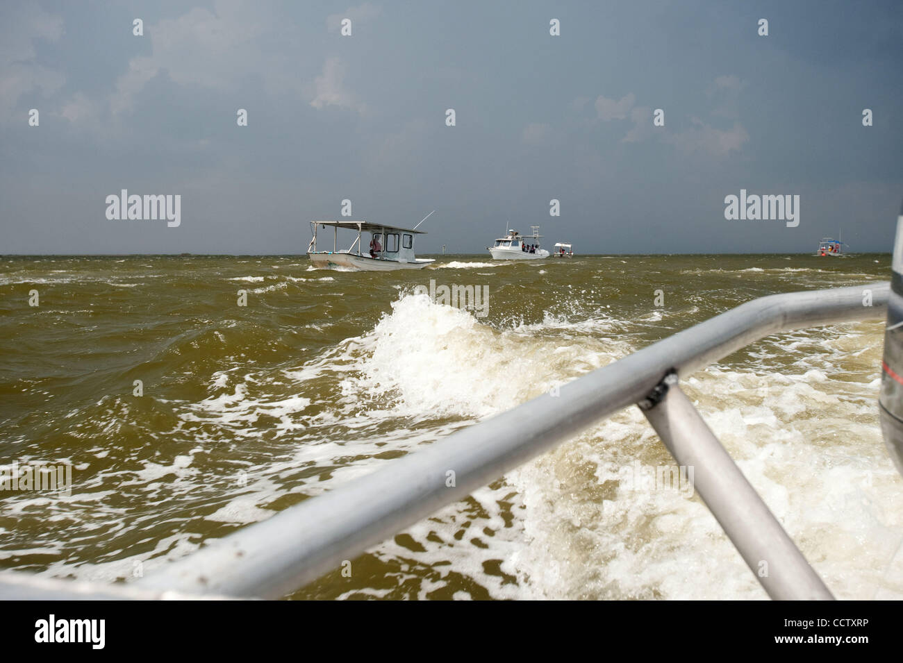 Clean up crews race back to the dock as thunderstorms approach the ...