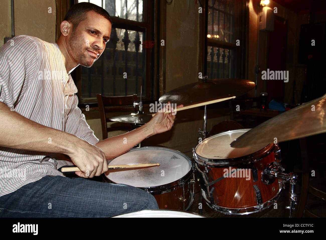 March 14, 2010 - Brooklyn, NY, U.S. - Drummer Adam Cruz at Barbes in ...