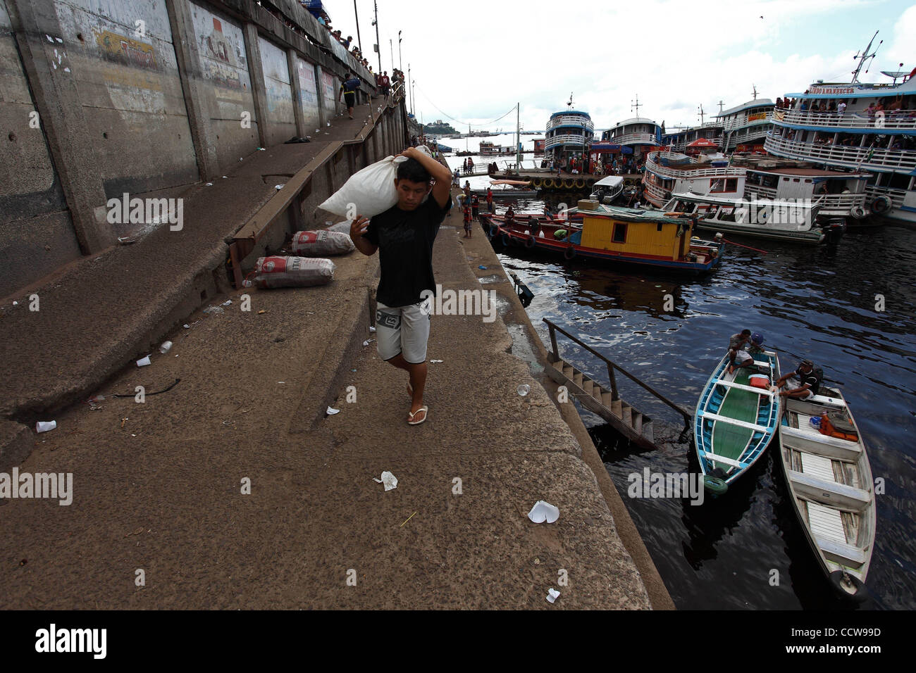 Mar 07, 2010 - Manaus, Amazonas, Brazil - Dock workers carry supply ...