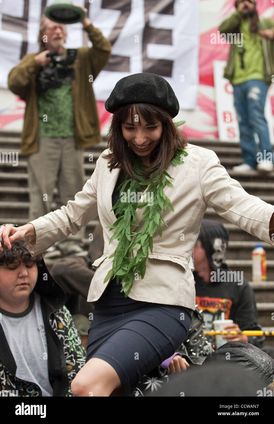 Jodie the wife of Marc Emery the "Prince of Pot" steps past some of the ...