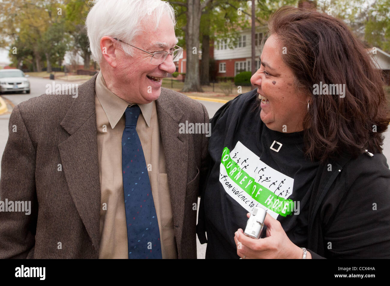 DELIA PEREZ MEYER hugs fellow supporter DAVID ATWOOD after hearing the ...