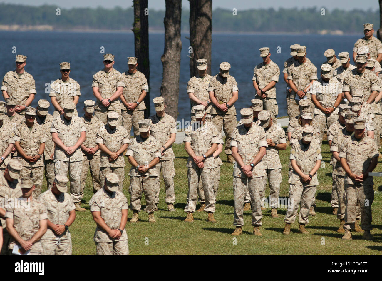 CAMP LEJEUNE, NC - APRIL 30: Marines bow their heads while praying at ...