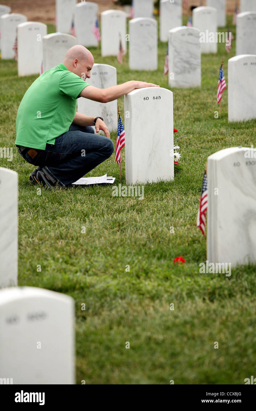 2nd Lt Benoit Bordellon visits the grave of Lance Corporal Adam Russell Murray at Arlington ...