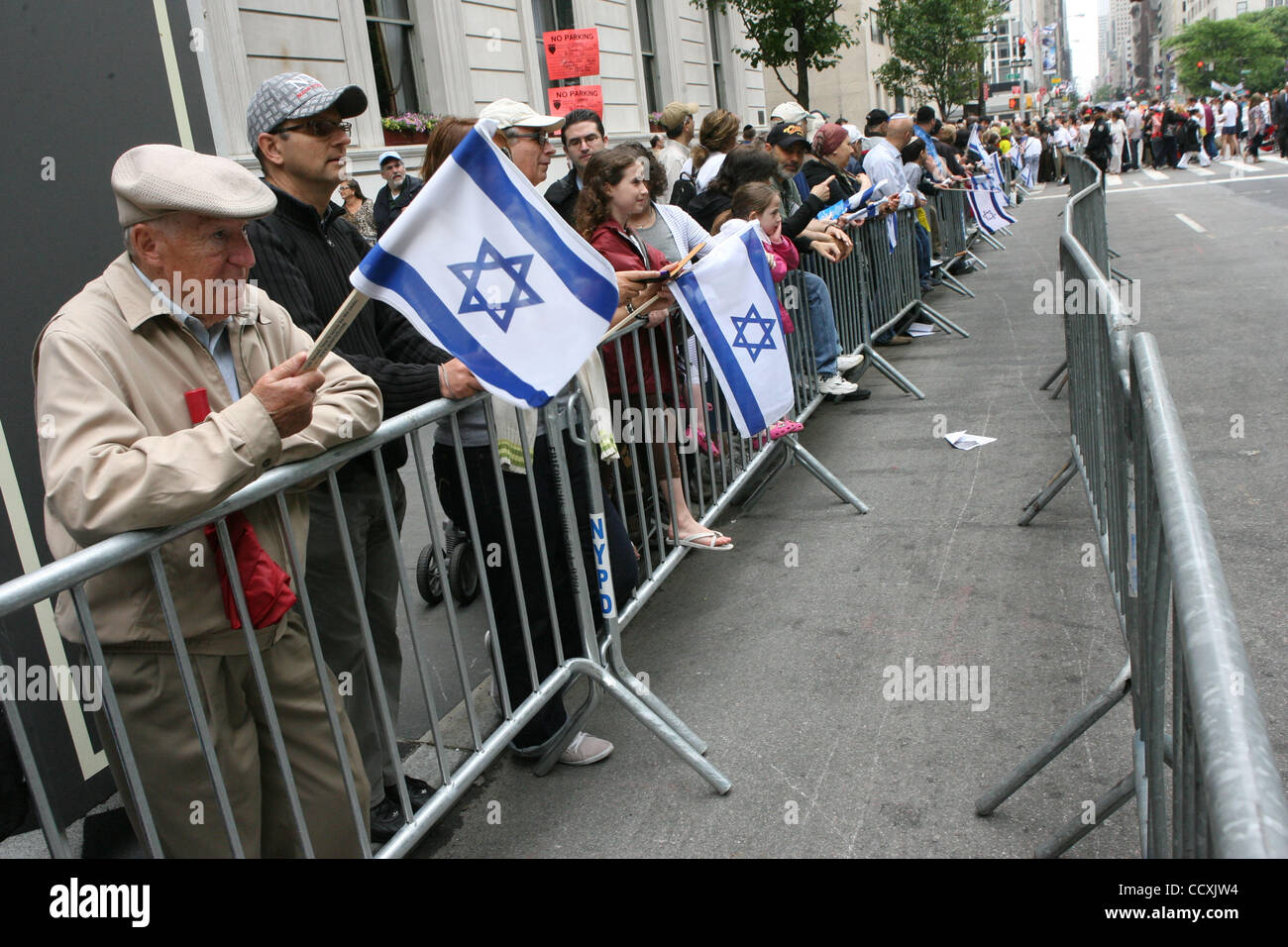 Two barricades separates the audience from the paradegoers today ...