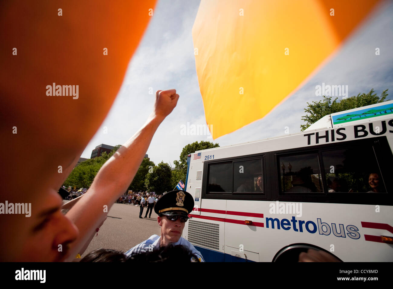 A bus carrying the approximately 40 demonstrators arrested for refusing ...