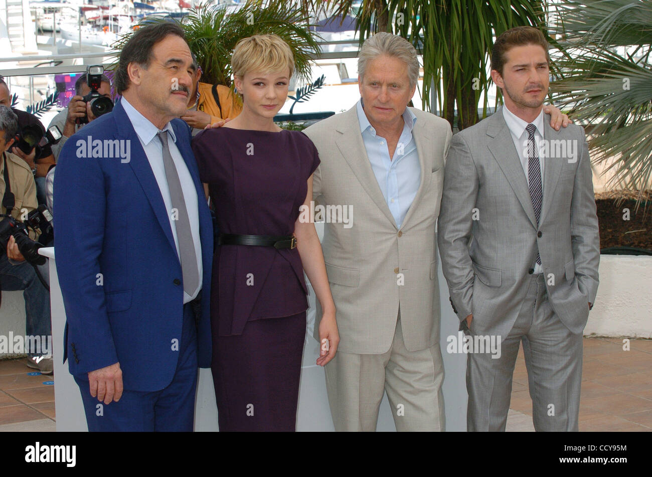 Director Oliver Stone, actors Carey Mulligan, Michael Douglas and Shia ...
