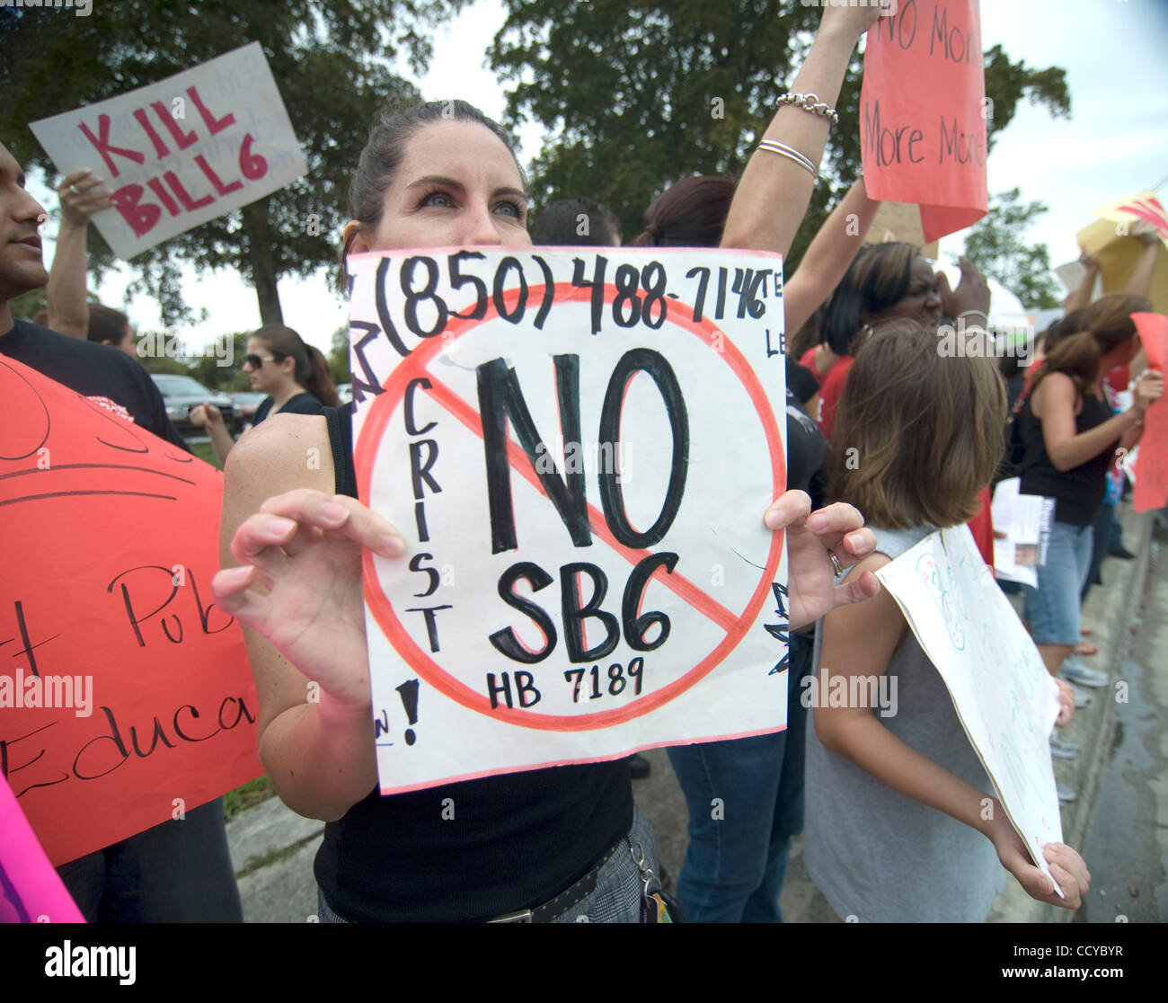 Cars passing protest signs hi-res stock photography and images - Alamy