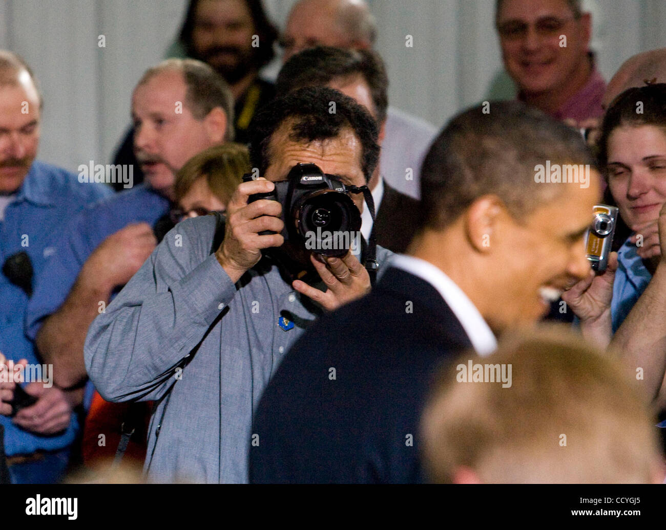 President BARACK OBAMA speaks to a small crowd of invited guests and ...
