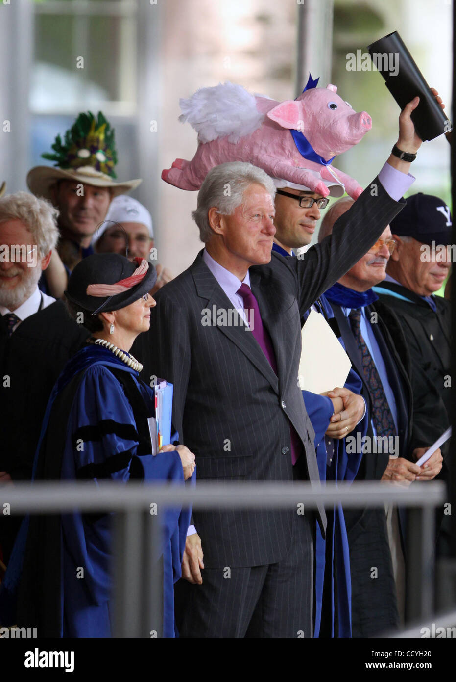 Former President Bill Clinton acknowledges applause at Class Day ...